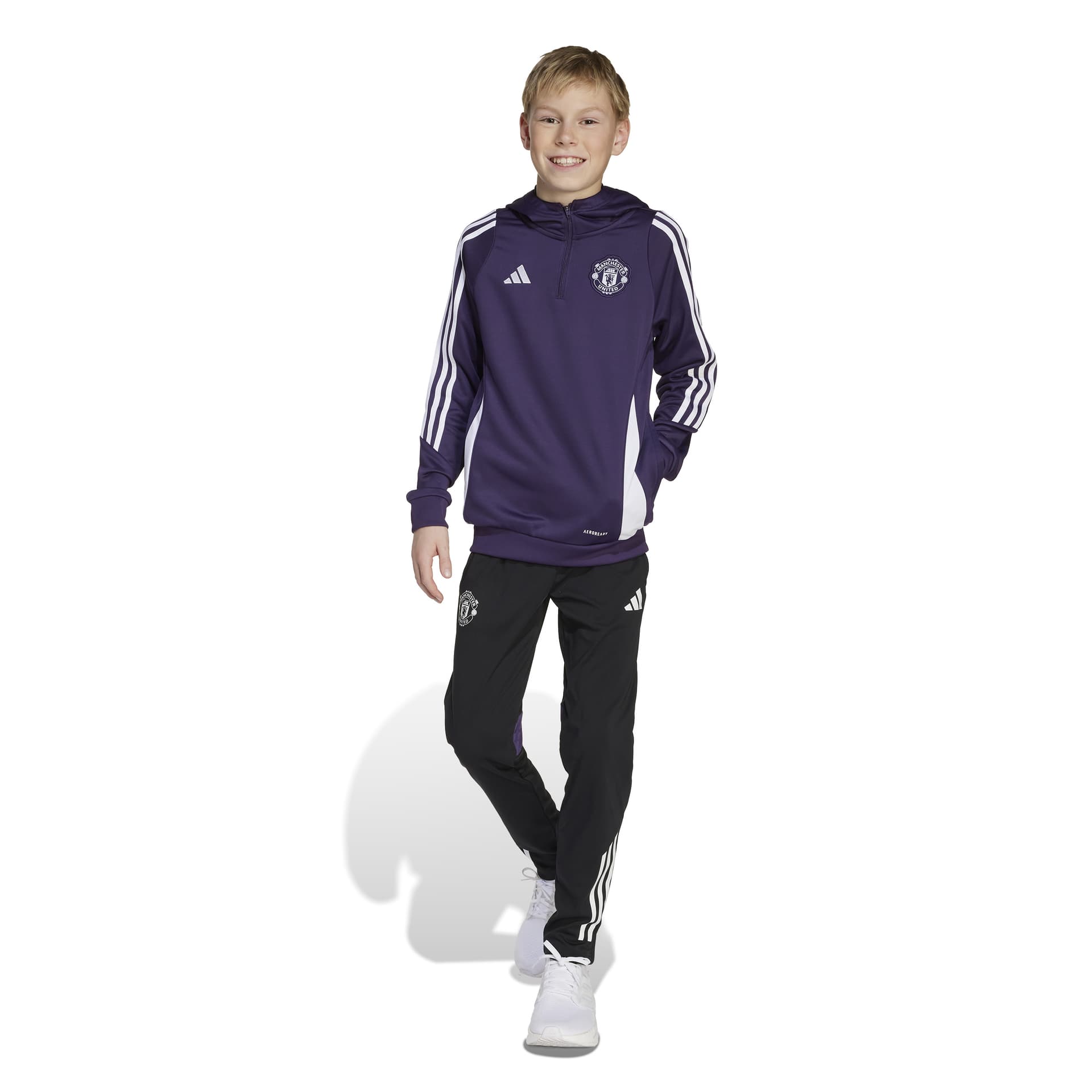 MANCHESTER UNITED JUNIOR POLY TRACKSUIT 2025-26 | CalcioItalia.com